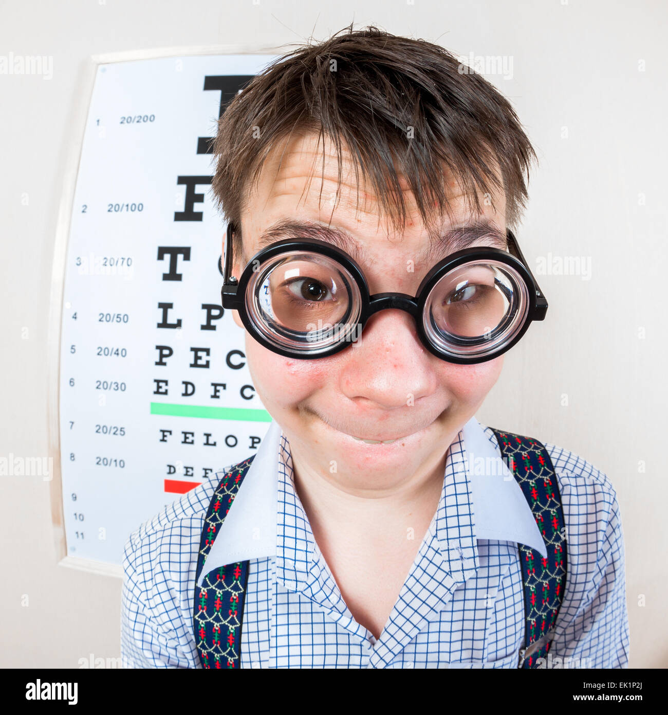 Person wearing spectacles in an office at the doctor Stock Photo - Alamy