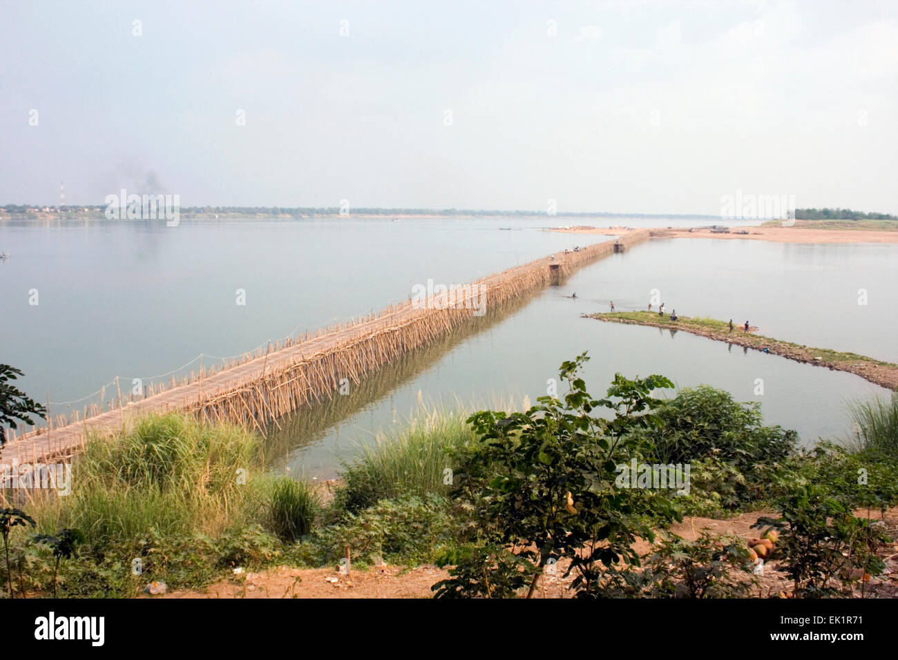 A bamboo bridge stretches over the Mekong river in Kampong Cham ...