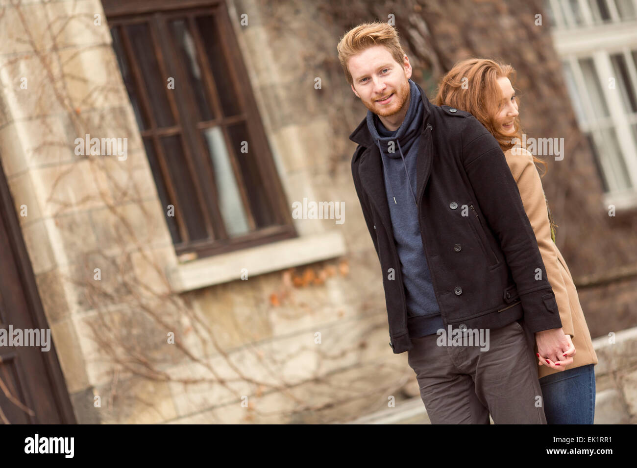 Young red hair couple at autumn park Stock Photo - Alamy