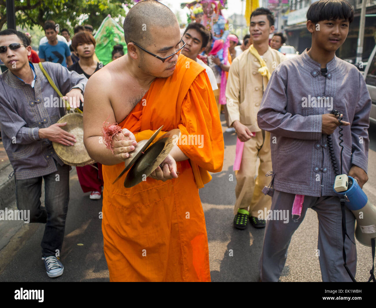 Chiang Mai, Thailand. 5th Apr, 2015. As Buddhist monk plays cymbals and ...
