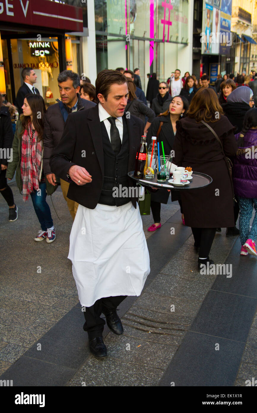 Waiter on the Champs-Élysées in Paris France Stock Photo - Alamy