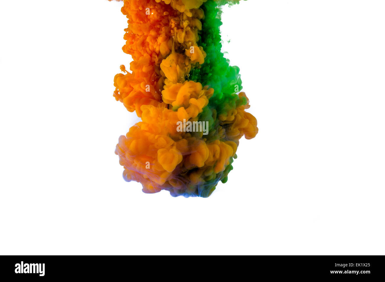 colorful ink creating smoke patterns in water Stock Photo - Alamy