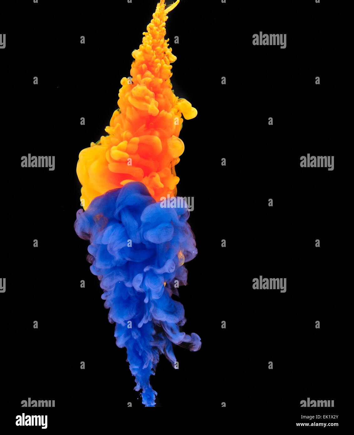 colorful ink creating smoke patterns in water Stock Photo - Alamy