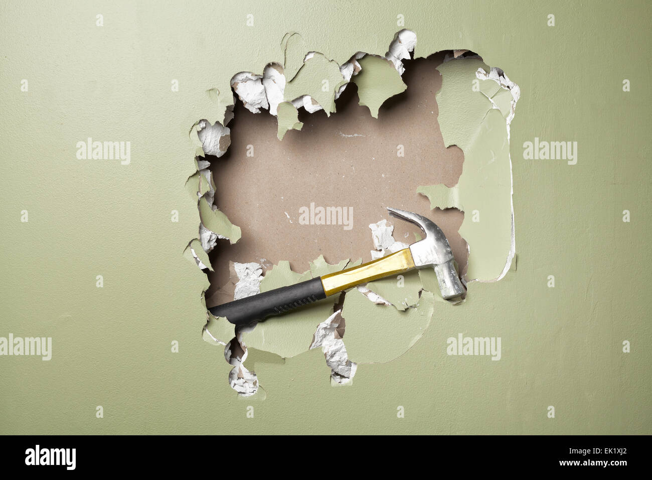 smash green wall hammer Stock Photo - Alamy