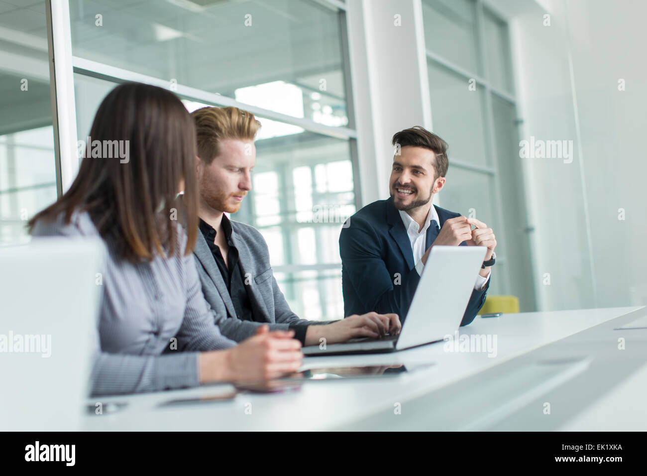 Young people in the office Stock Photo - Alamy