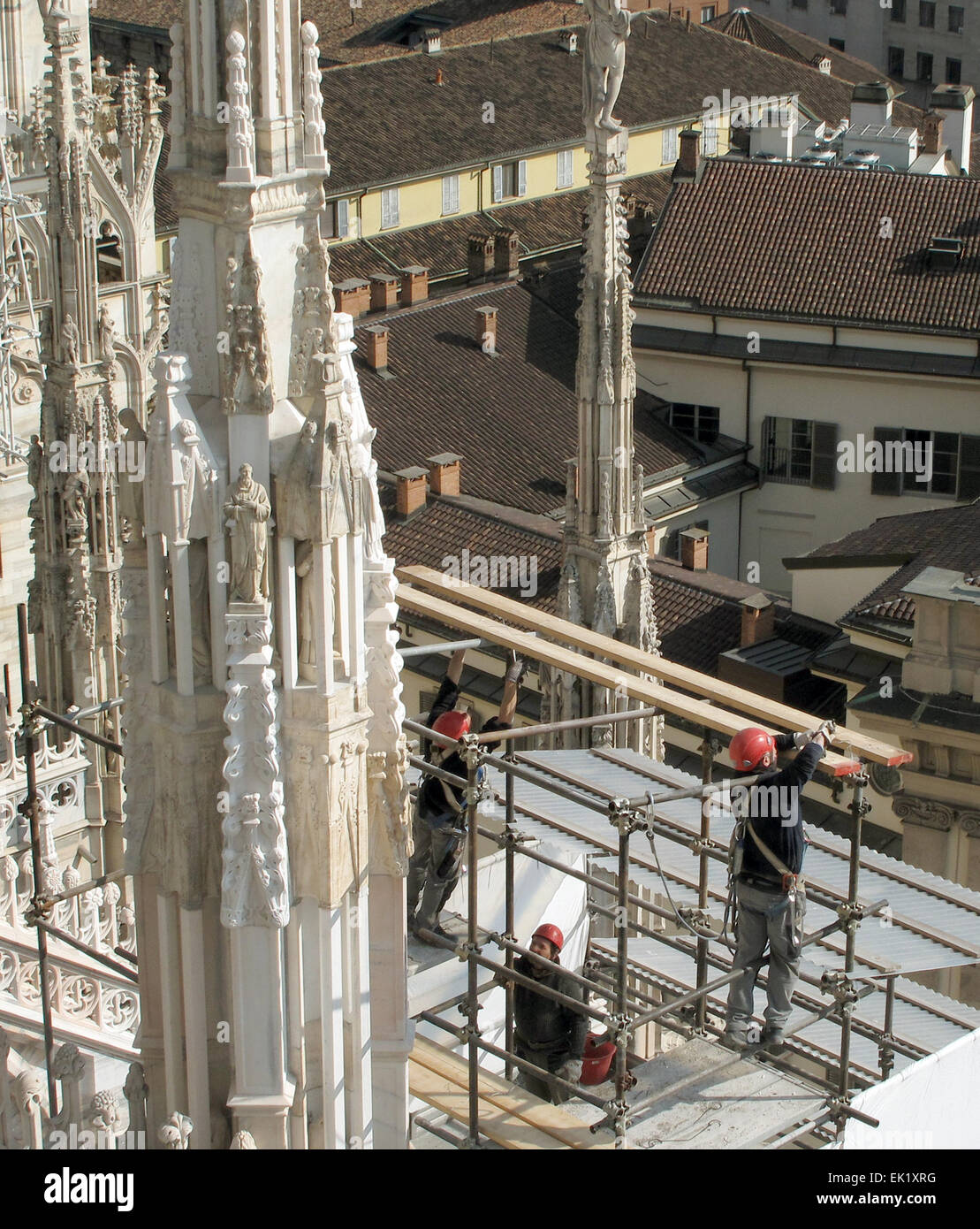 Milan, Italy. 13th Mar, 2015. Construction workers are working on the ...