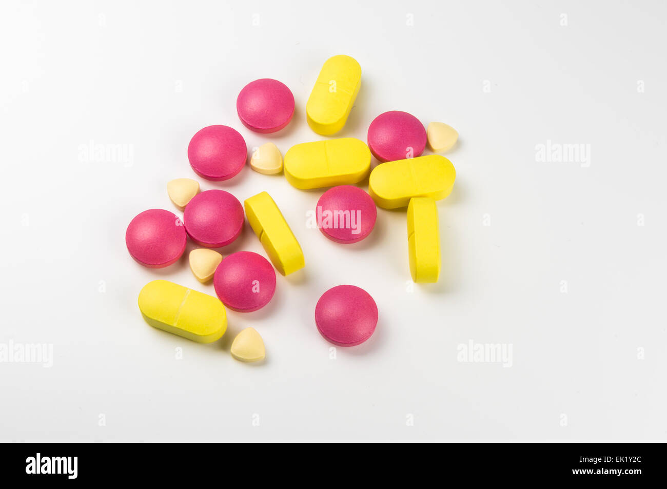 Pills and syringe on pink background hi-res stock photography and ...