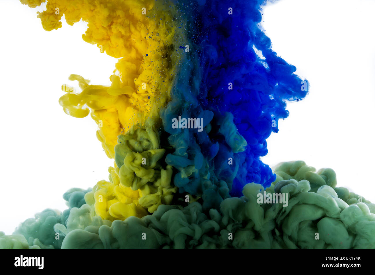 Colorful ink making abstract smoke patterns in water Stock Photo - Alamy