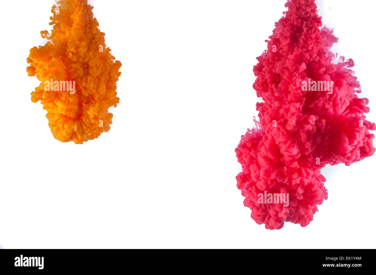 Colorful ink making abstract smoke patterns in water Stock Photo - Alamy