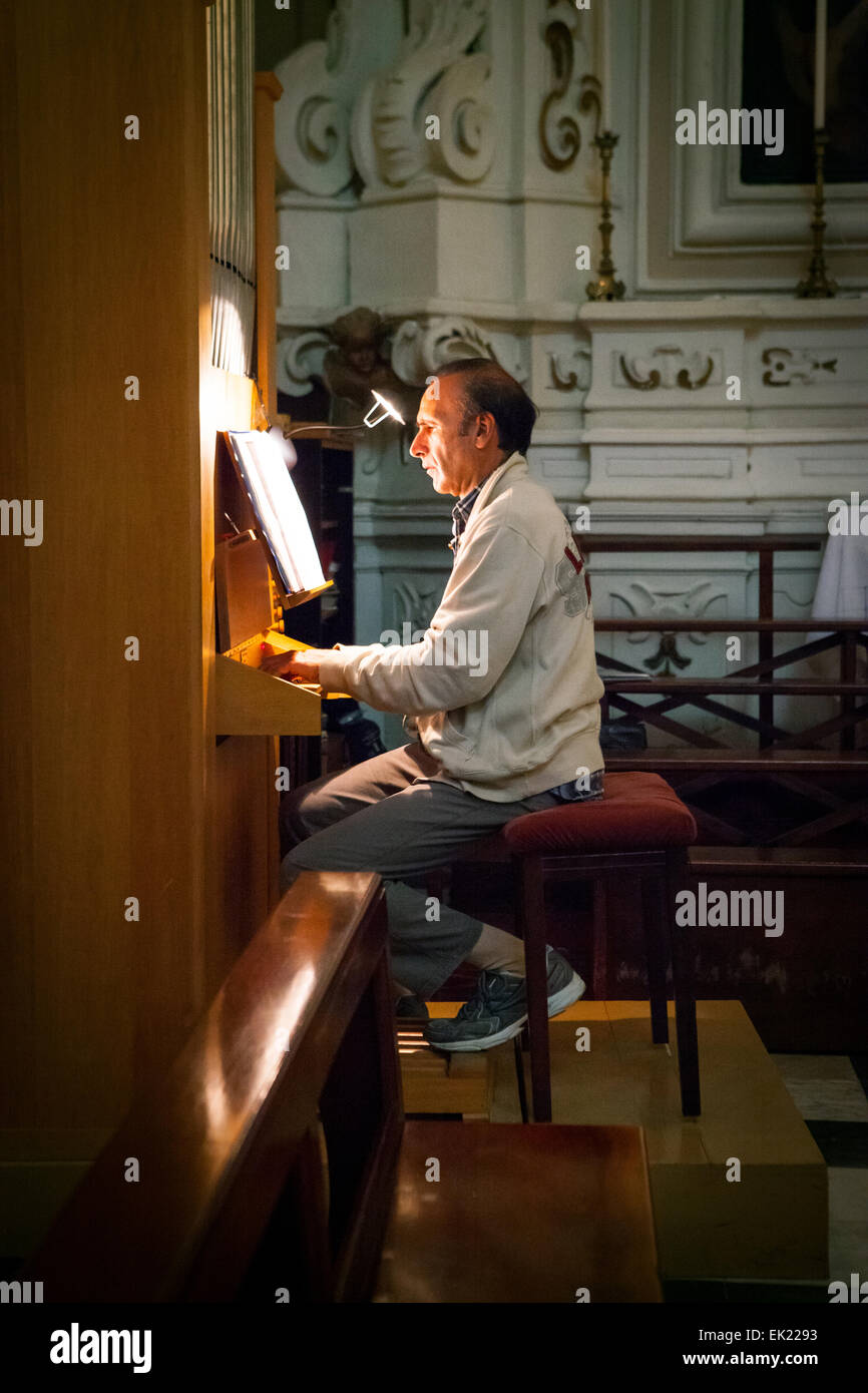 The organist practices at the Cathedral of Gallipoli, province of Lecce ...