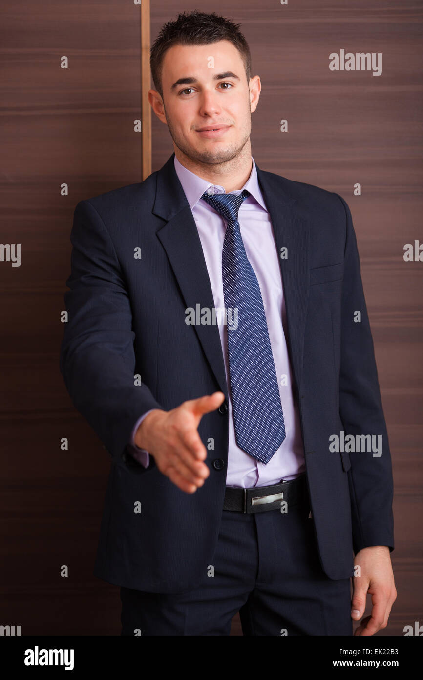 Man shows hand sign Stock Photo - Alamy