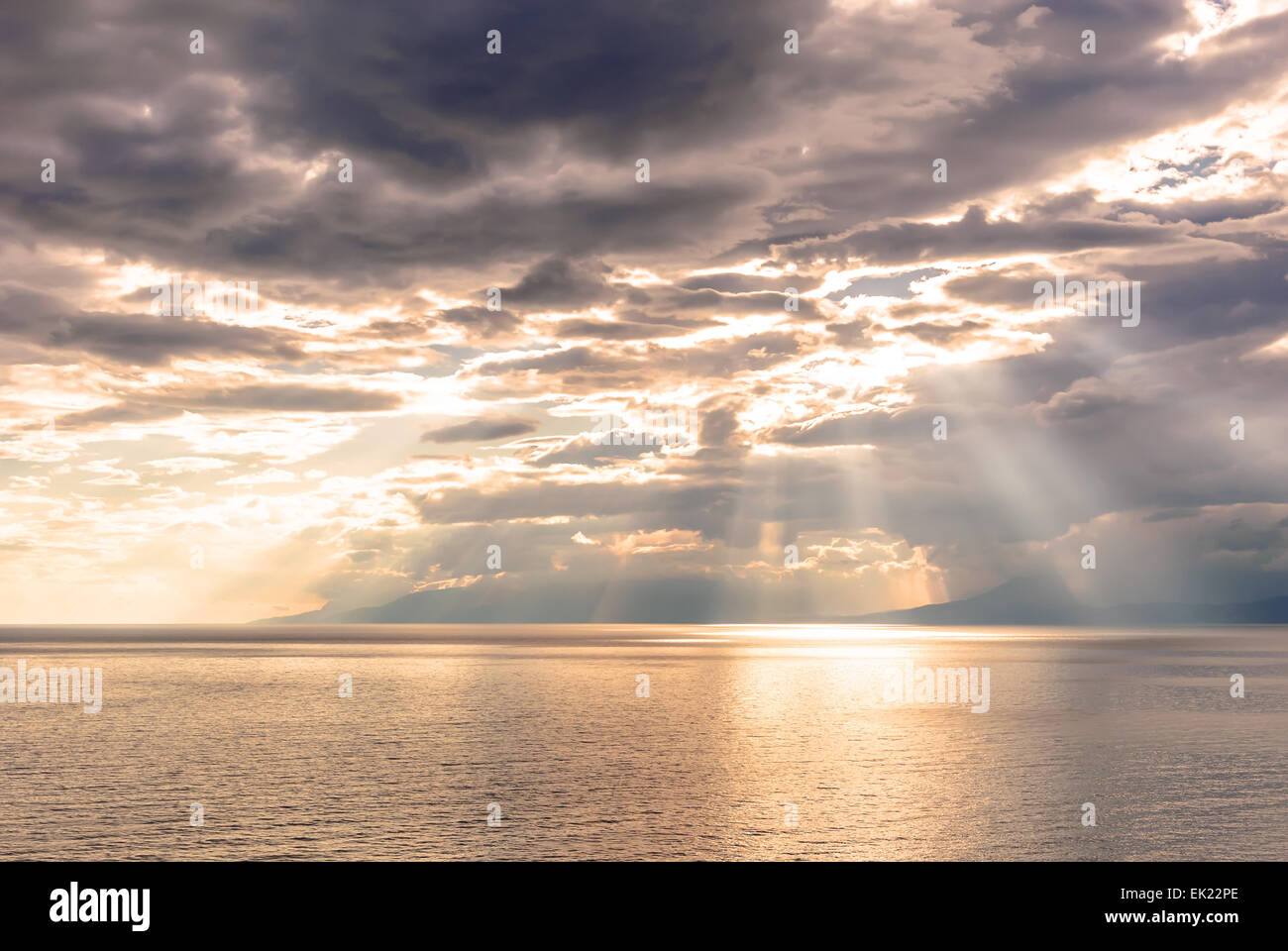 Sun rays pass through clouds hi-res stock photography and images - Alamy