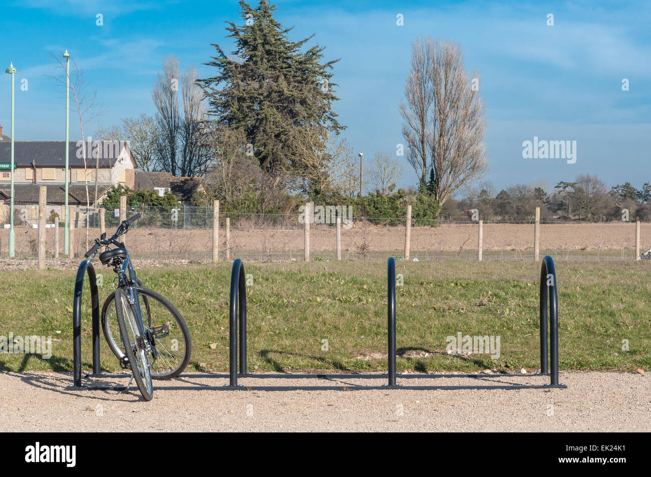 Bike rack in a park Stock Photo - Alamy