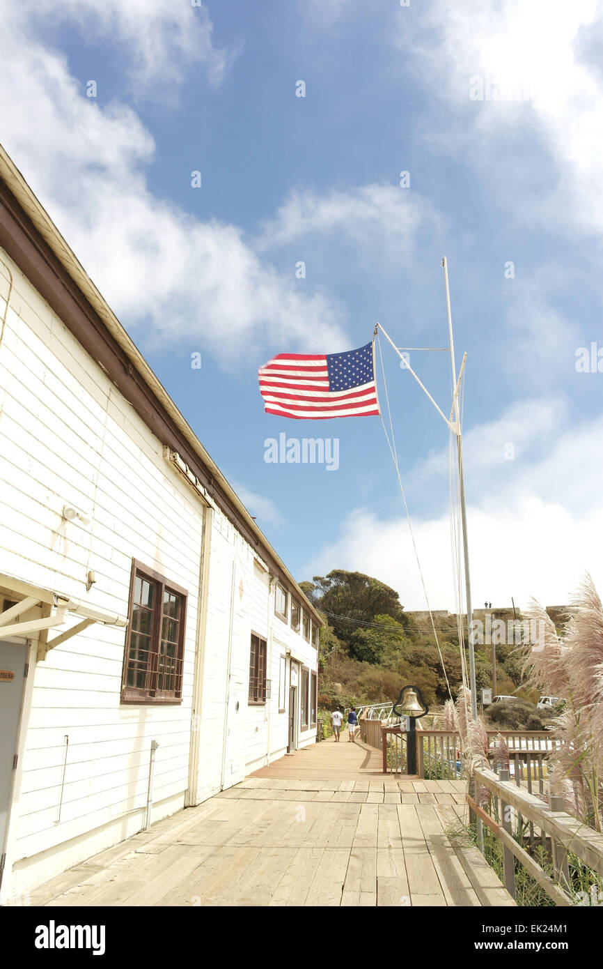 Blue sky white clouds portrait, to Battery Yates, American Flag flying ...