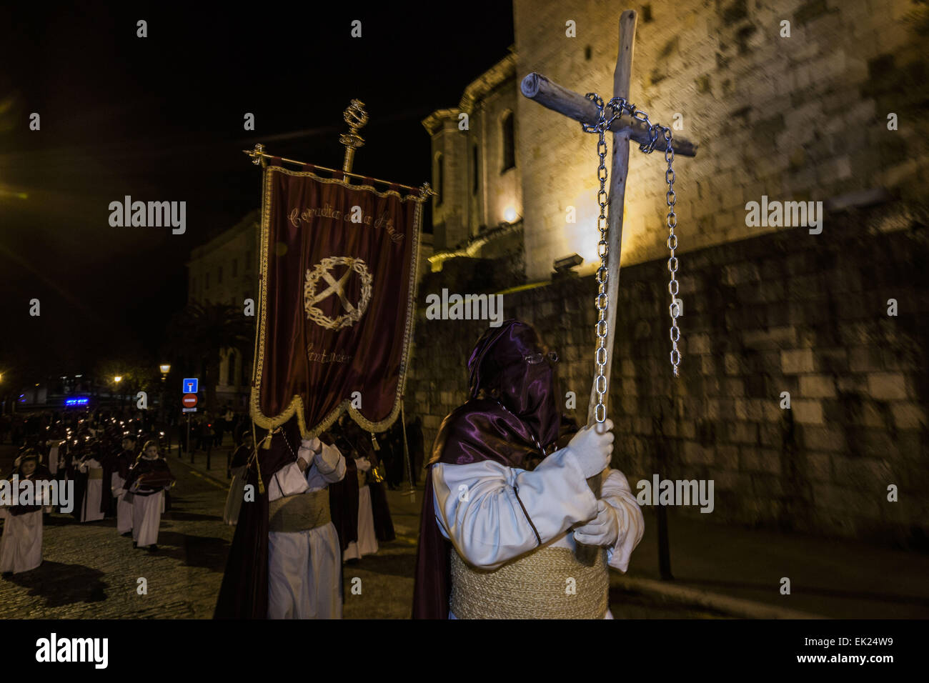 Santander, Cantabria, Spain. 3rd Apr, 2015. Penitent carries a chained ...