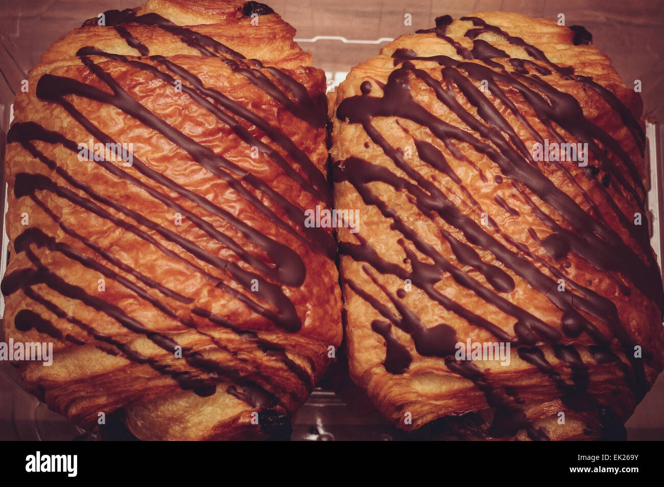 Fresh chocolate croissants on white background Stock Photo - Alamy