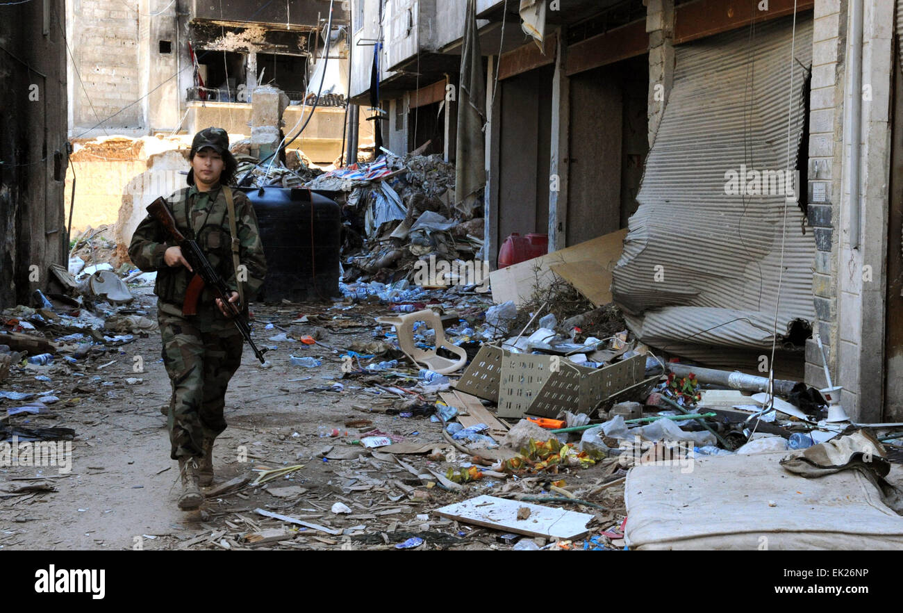 Damascus, Syria. 5th Apr, 2015. A female sniper patrols in Daraya ...