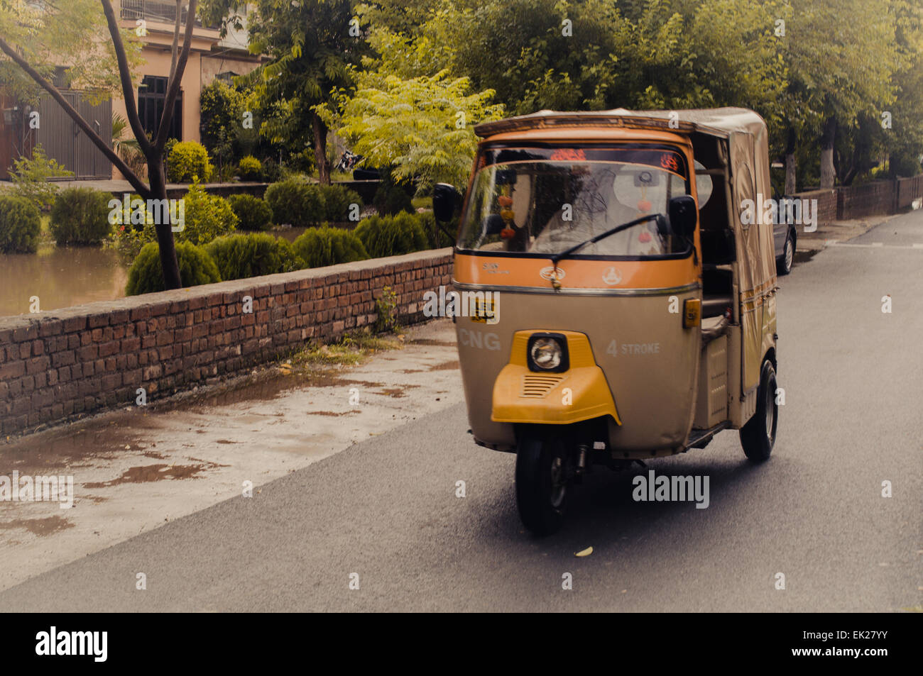 Traditional tuk-tuk from Lahore, Pakistan, in motion blur Stock Photo ...