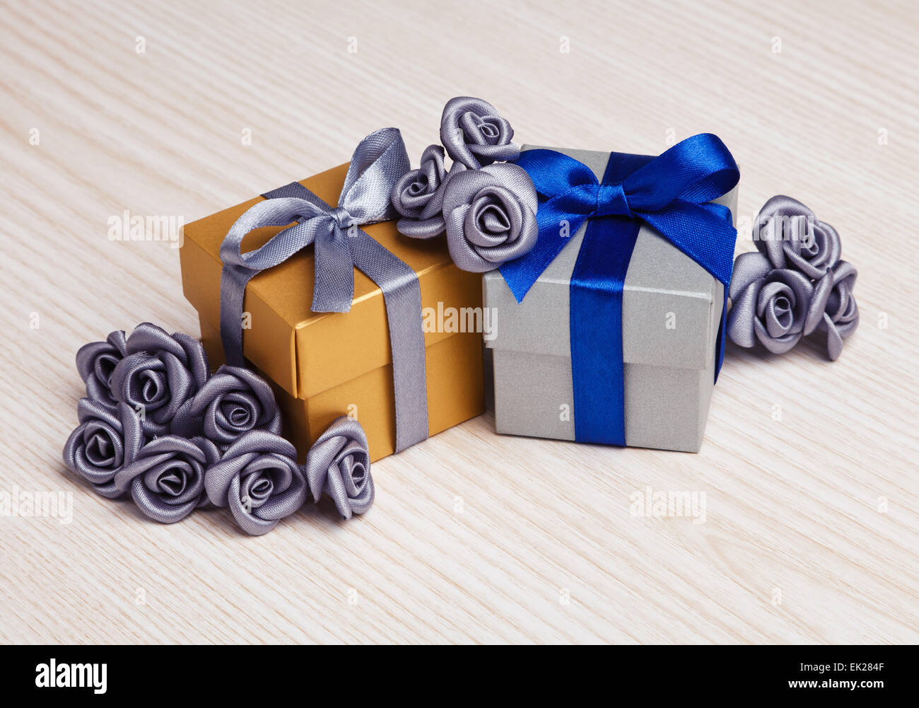 grey flowers and two gift boxes Stock Photo - Alamy