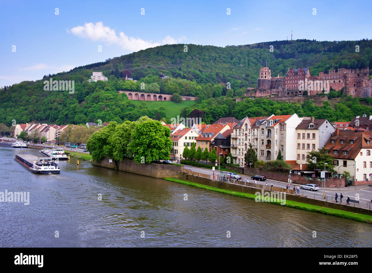 Barges in the river and cityscape of european city in summer Heidelberg ...