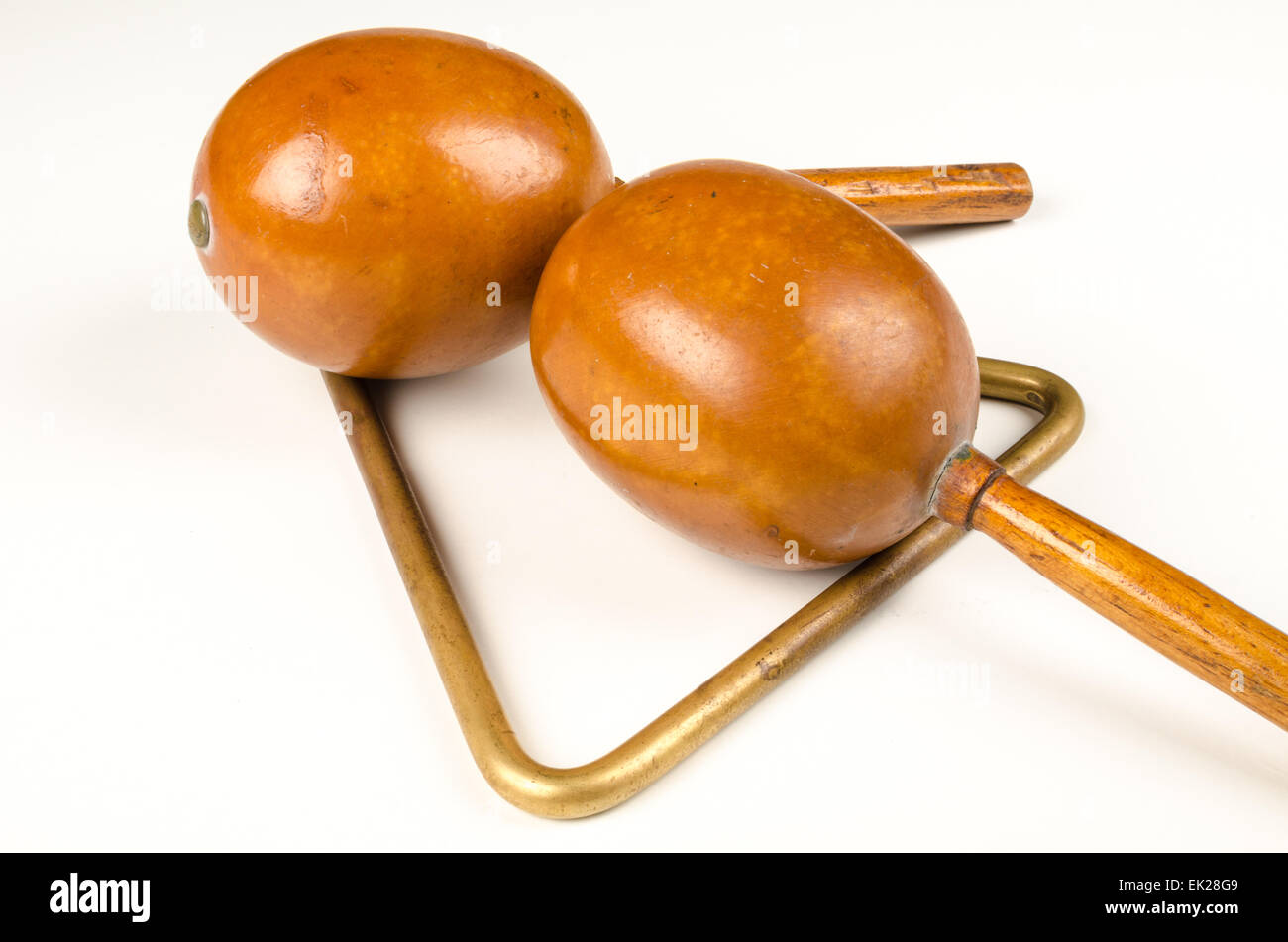 Studio shot of maracas and triangle, small percussion instruments Stock ...