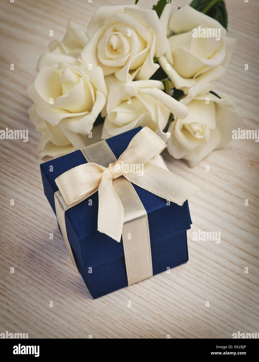 white roses and blue gift box Stock Photo - Alamy