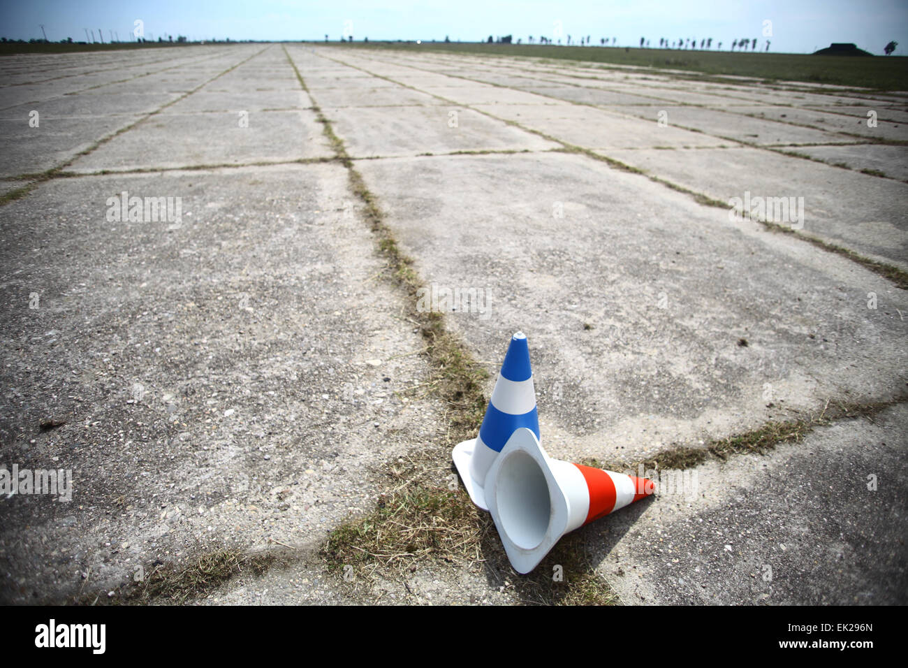 Two cones, red and blue, on the road Stock Photo - Alamy