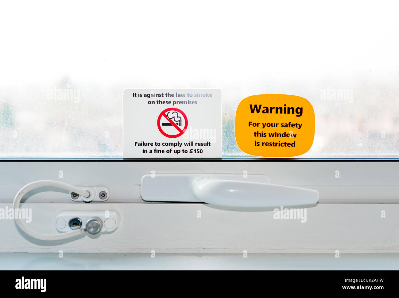 Window no smoking warning sticker Stock Photo - Alamy