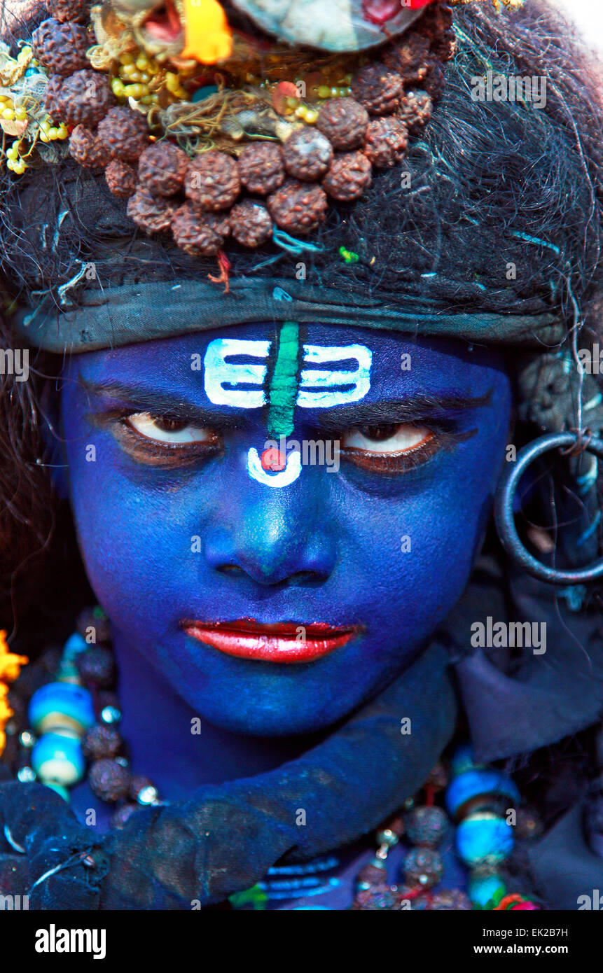 Indian boy face painted as the Hindu god Shiva at Pushkar fair ...