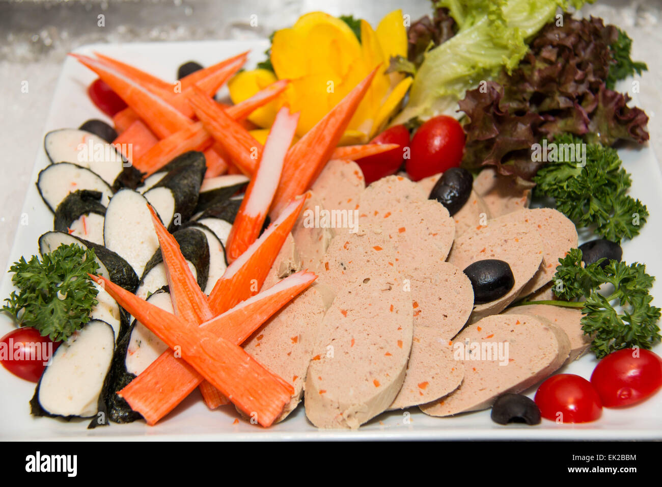 Cold cut slices on board with pepper Stock Photo - Alamy
