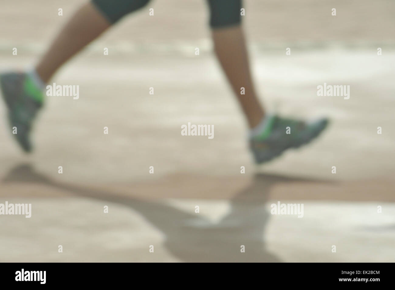 Woman running blur hi-res stock photography and images - Alamy