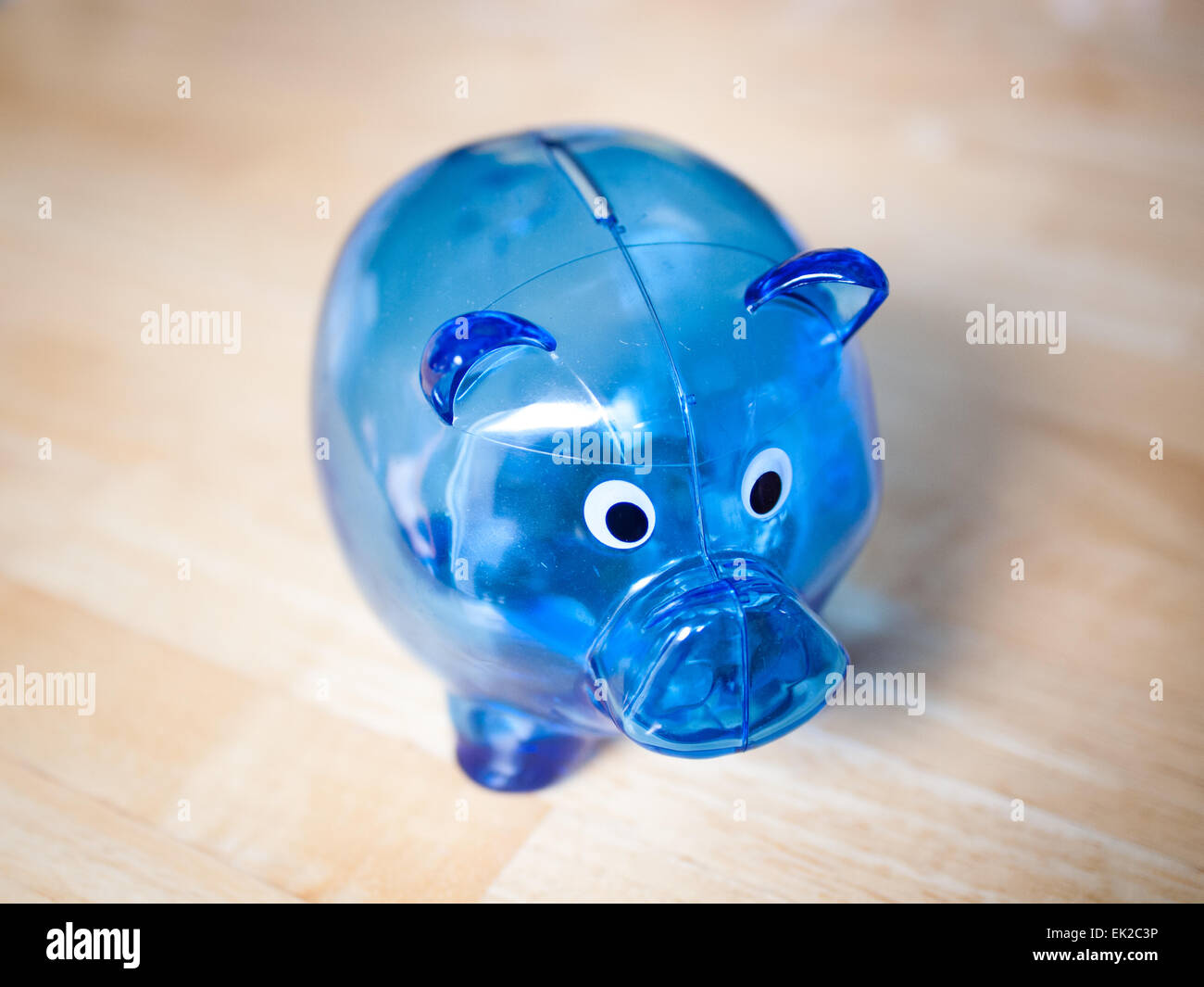 A blue piggy bank Stock Photo - Alamy