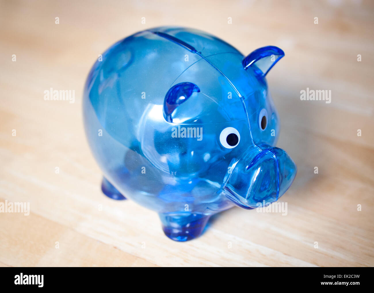 A blue piggy bank Stock Photo - Alamy