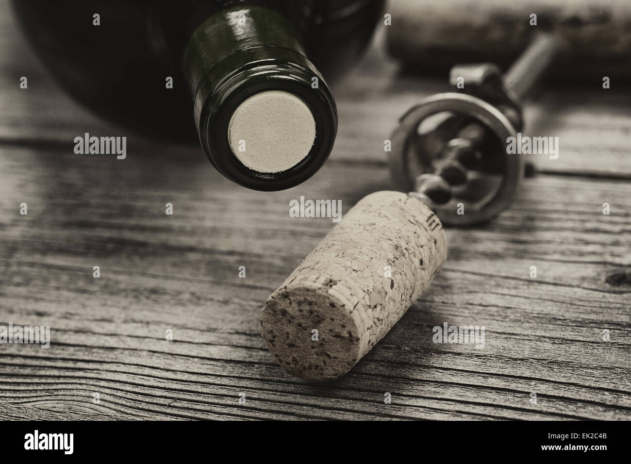 Close up shot of top of wine bottle cork with antique opener in ...