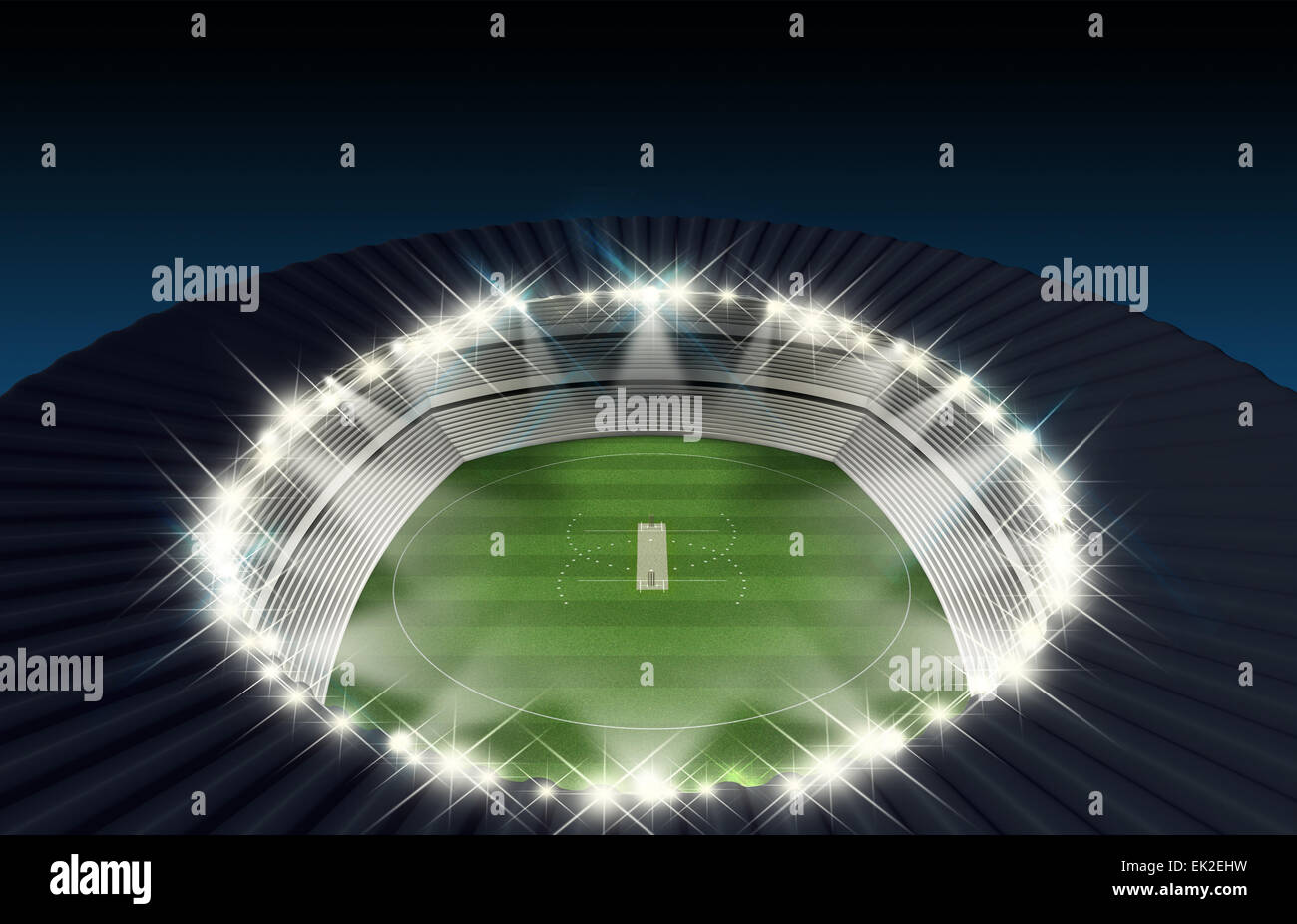 A cricket stadium with a pitch on a marked green grass field in the ...