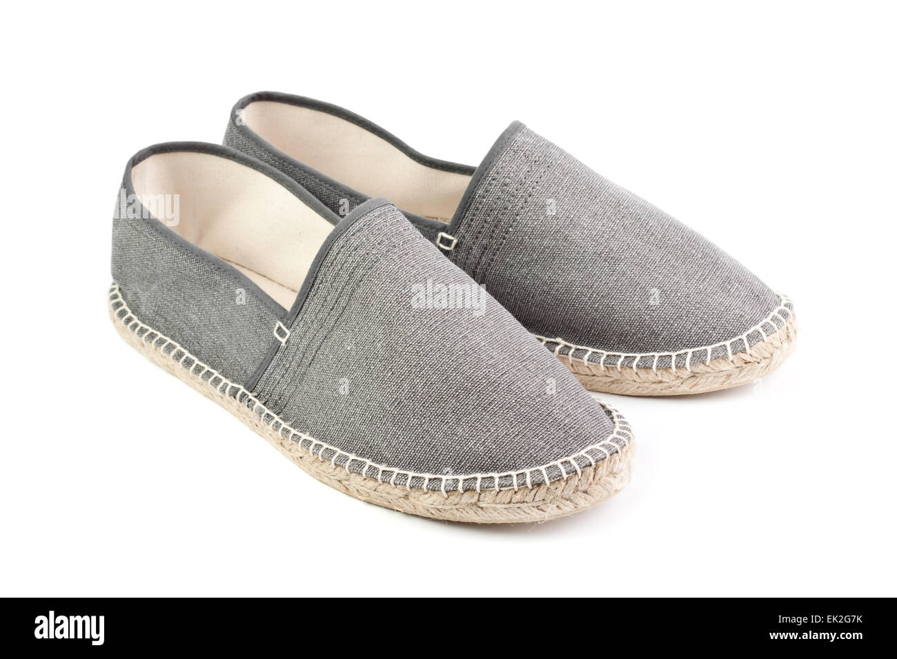 pair of gray men sneakers isolated on white background Stock Photo - Alamy