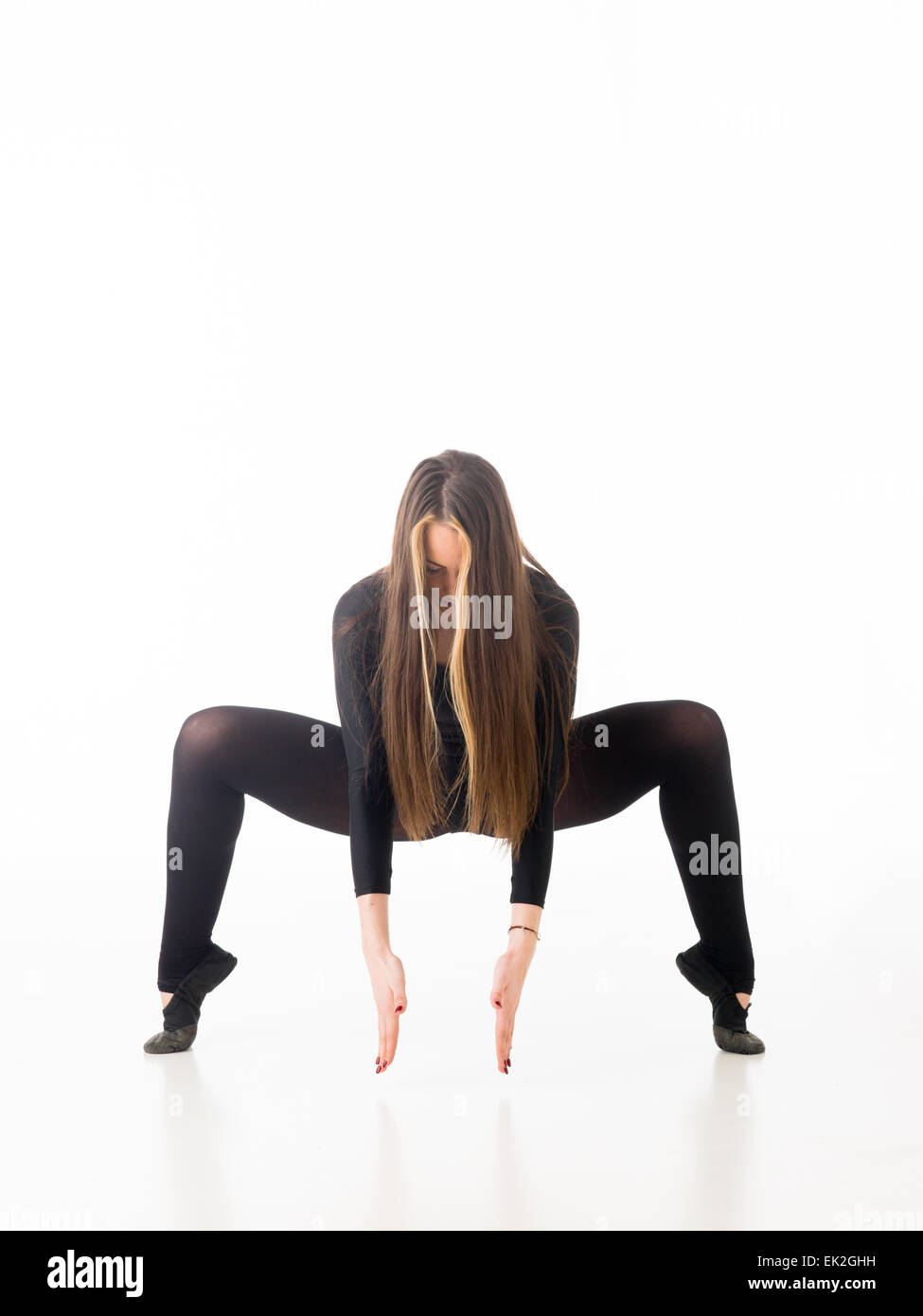 female dancer exercising dance choreography, on white background Stock ...