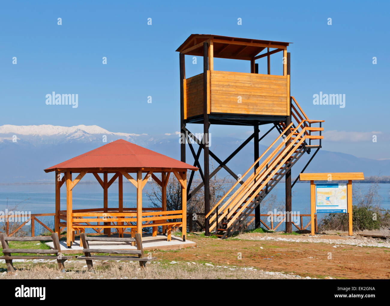 Wooden kiosk, watchtower and informative billboard at protected wetland ...