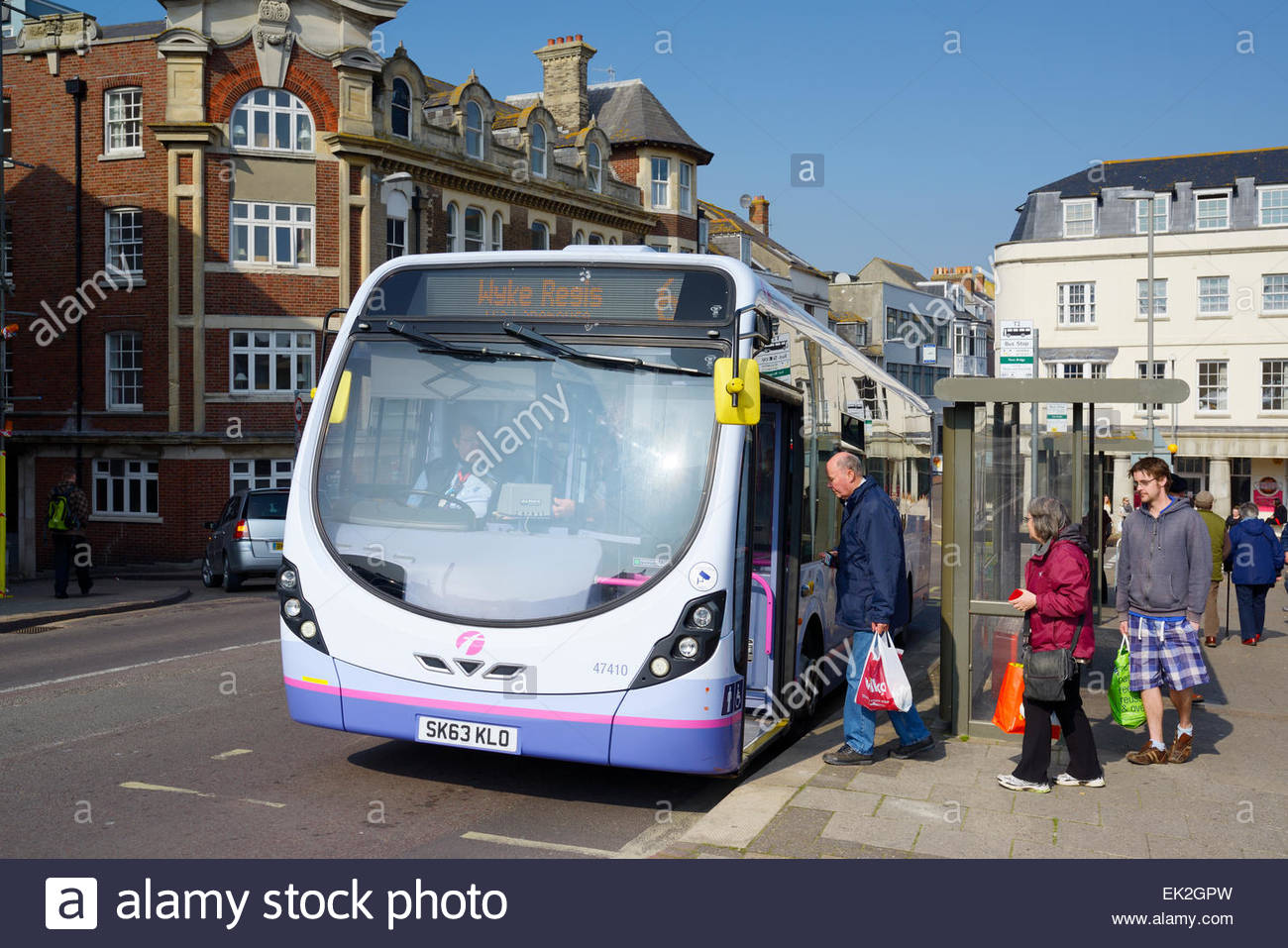 Passengers Boarding Bus Stock Photos & Passengers Boarding Bus Stock ...