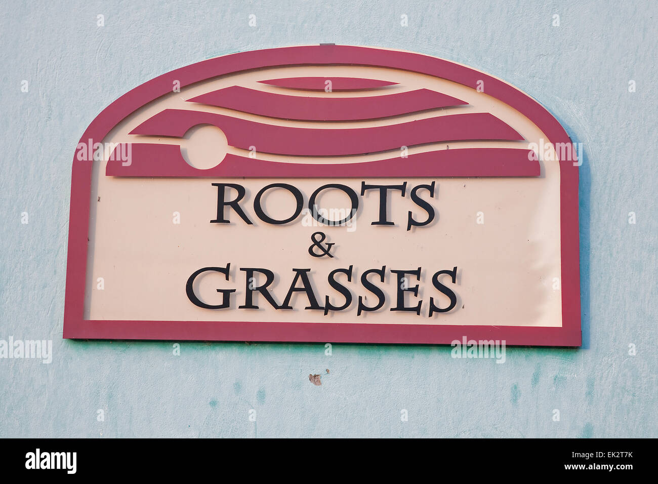 Roots and grasses sign in Barbados Stock Photo - Alamy