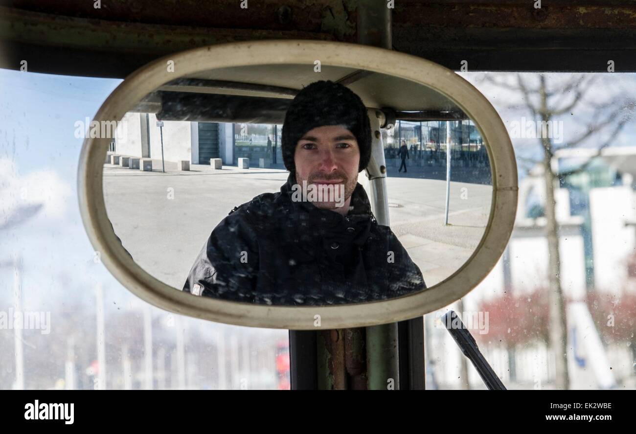 Michael Gies is looking through the rearview mirror of his tractor of ...