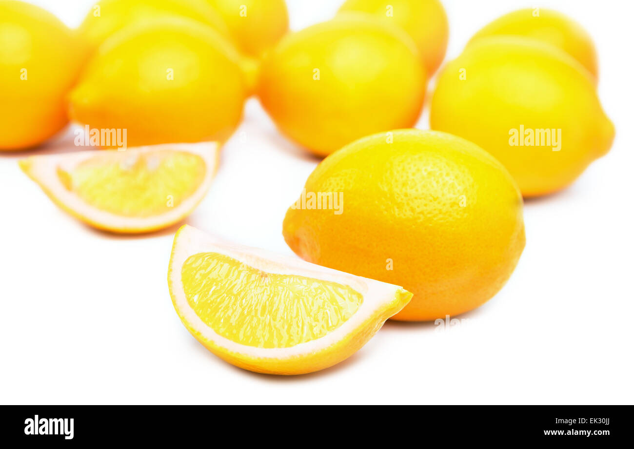 ripe lemons on a white background Stock Photo - Alamy