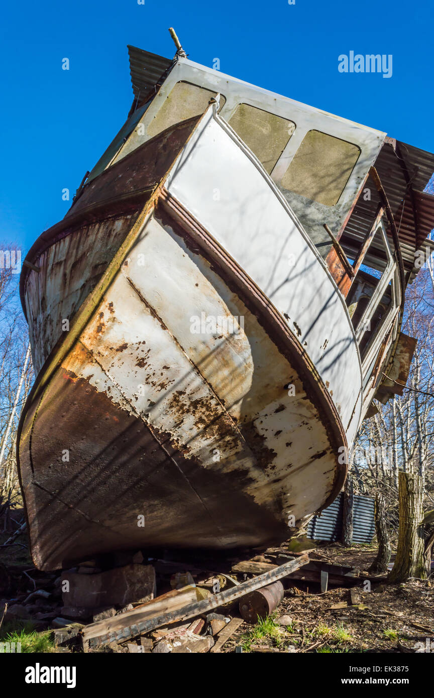 Old shipwreck of passenger boat all the way up into the forest where it ...