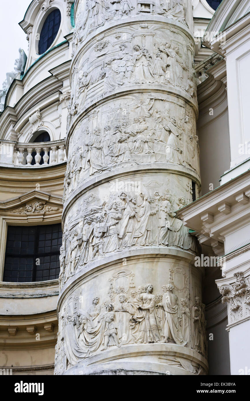 Carved bas relief on a huge marble column outside the Karlskirche ...