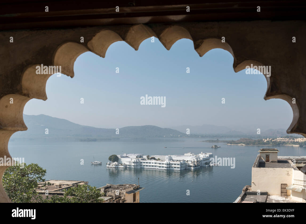 Lake Palace Hotel seen through City Palace Window, Udaipur, Rajasthan ...