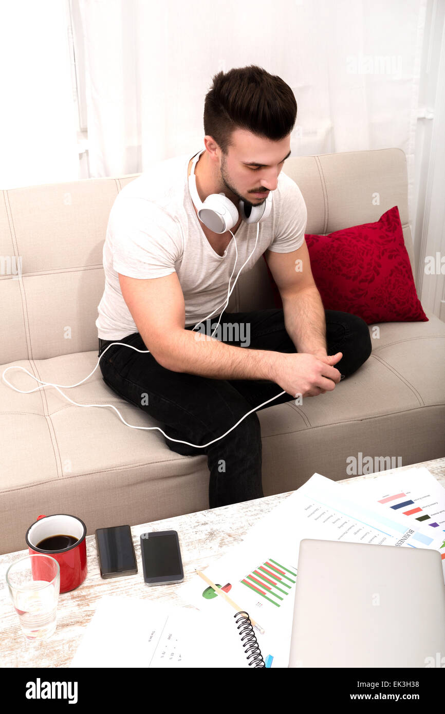 Relaxing after working long hours at home Stock Photo - Alamy