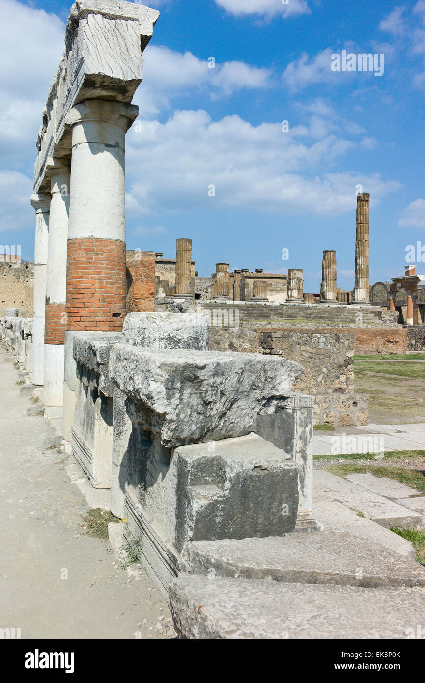 Marble, stone and brick columns in The Forum in the archaeological excavations of Roman Pompeii ...