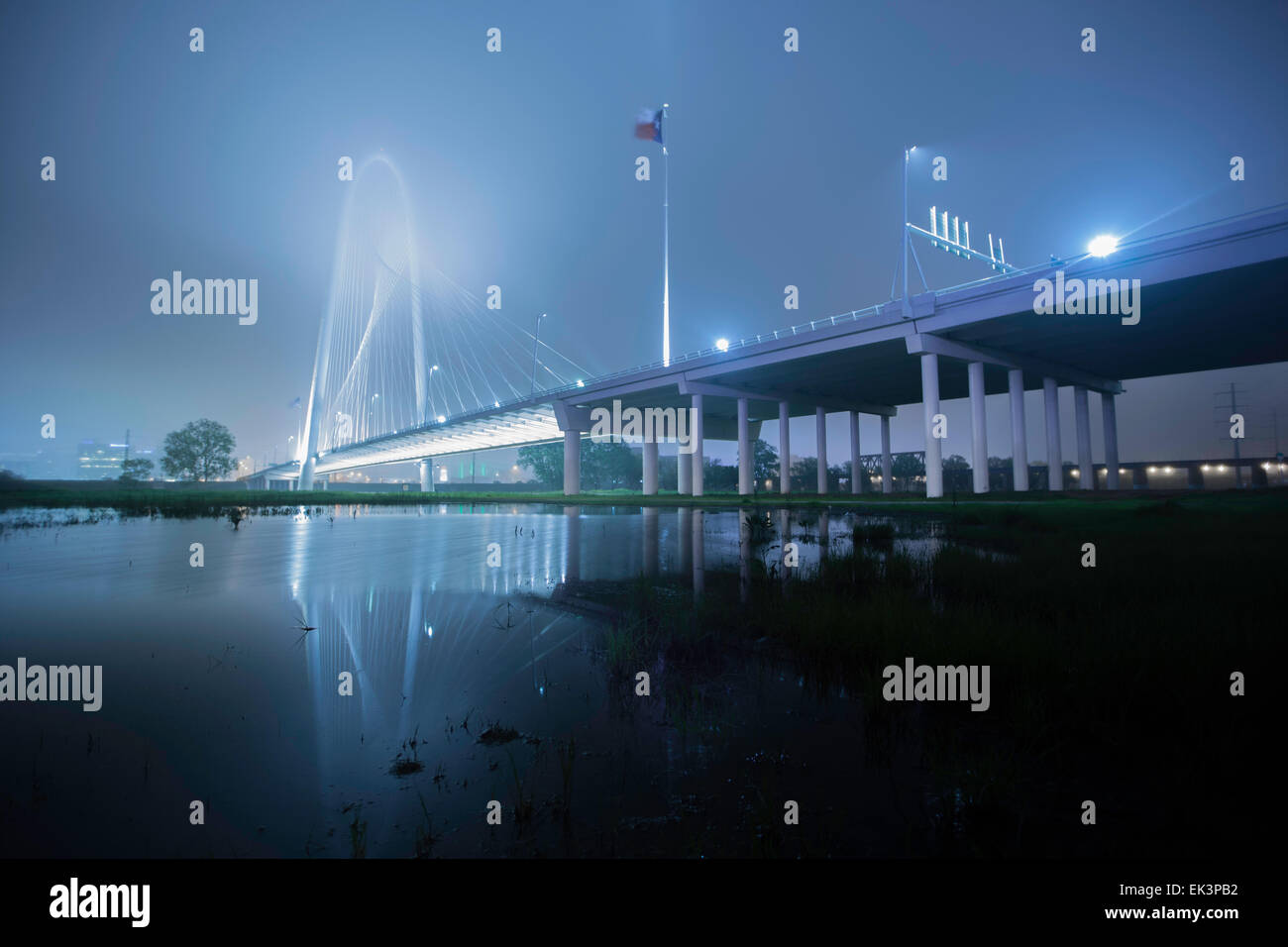 Wide long exposure shot of Margaret Hunt Hill Bridge in downtown Dallas ...