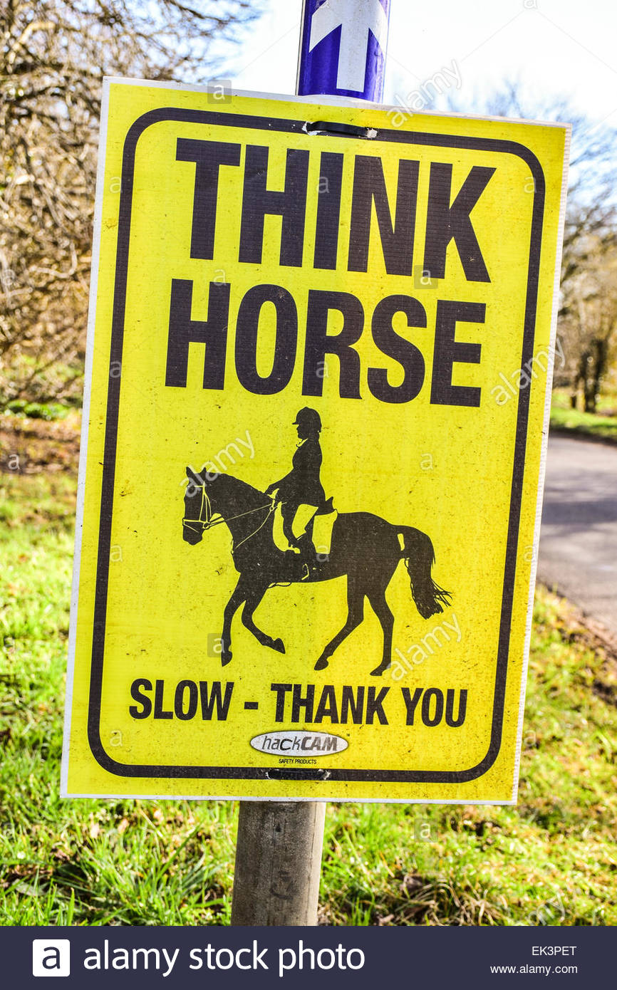 Slow Down Warning Road Sign High Resolution Stock Photography and ...
