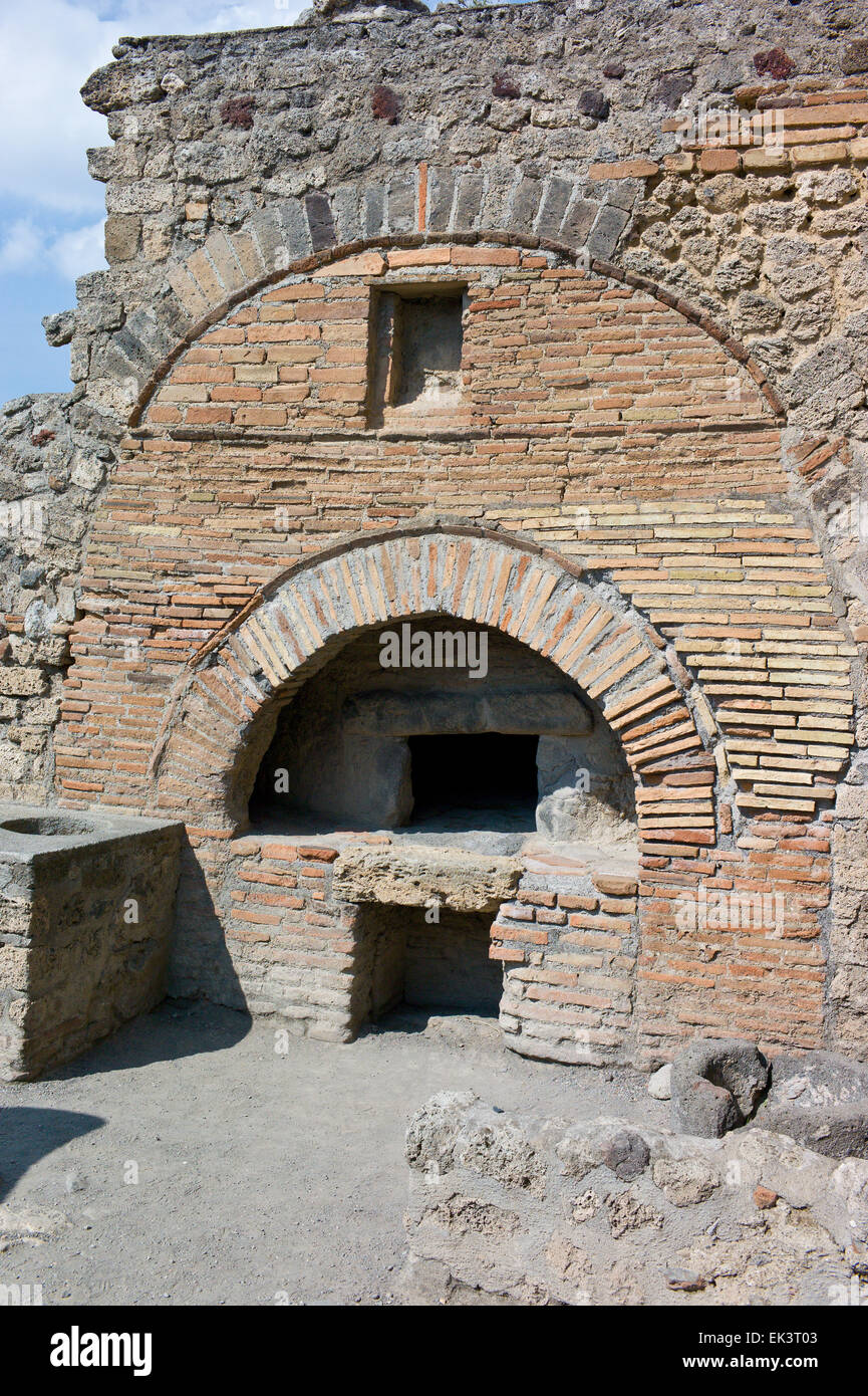 A bakery oven in the archaeological excavations of Roman Pompeii near ...
